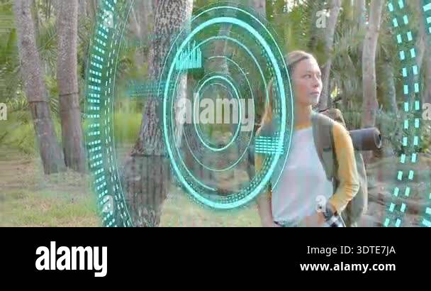 Hiker adjusting backpack straps while AR interface scanning palm grove ...