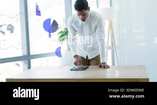 Male manager leaning over desk and tapping tablet, generating animated ...