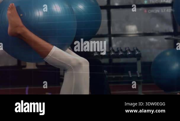 Two women raising legs squeezing balls lifting hips while overlaying ...