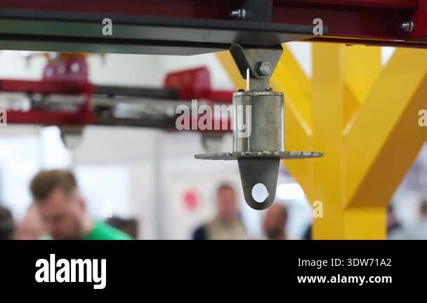 Suspension trolley unit on linear guide with rollers, featuring ...