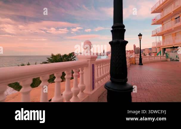 Beautiful sunrise over the city of benidorm, spain, with the ...
