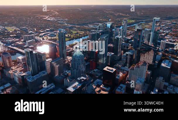 Wide aerial cityscape of Austin Texas at golden hour. Panoramic view of ...