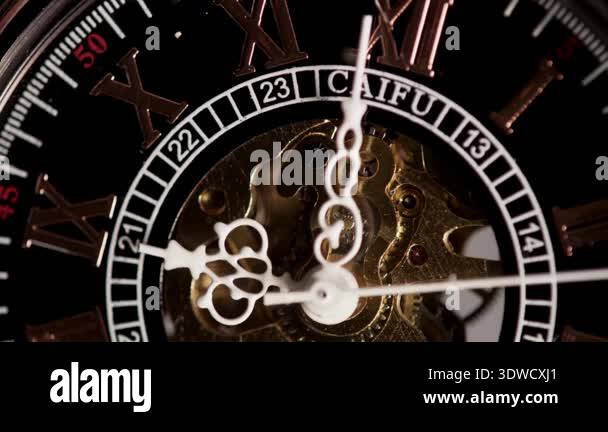 Close up macro shot of an elegant skeleton watch face with visible ...