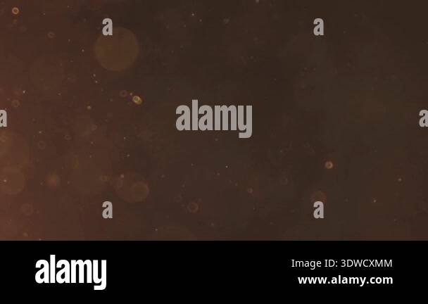 Densely packed golden bokeh spheres and shimmering dust particles ...