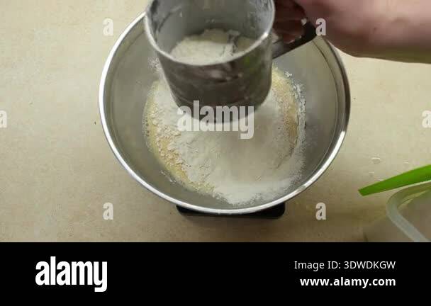 Sifting Flour into Mixing Bowl for Baking Close Up Stock Video Footage ...