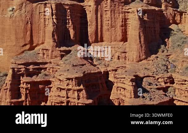 Stunning rock formations and geological strata define Kyrgyzstans arid ...