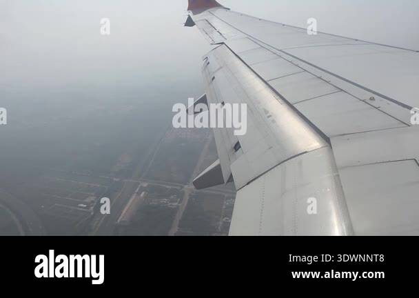view of wing of wing flying above airplane Stock Video Footage - Alamy