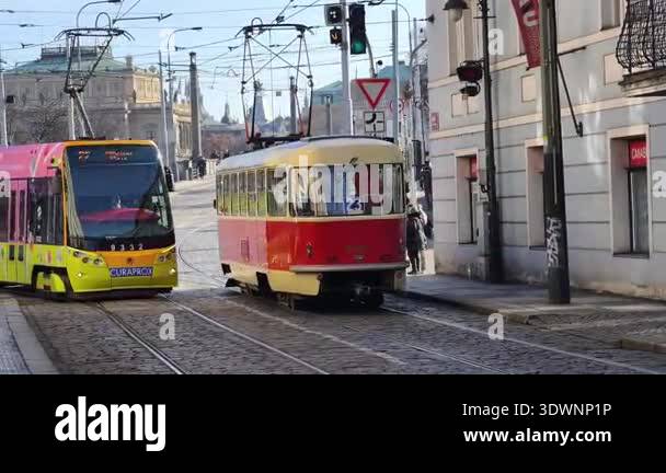 Prague, Czech Republic February 25, 2026: Modern and vintage trams ...