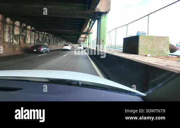 New York, USA, 5 February 2026: Vehicle driving on highway underpass ...