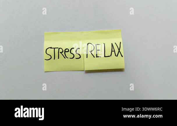 Two yellow adhesive sticky notes with the words stress and relax ...