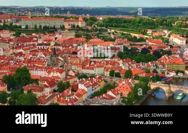 Prague city across rooftops. Prague urban pattern from above. Prague ...