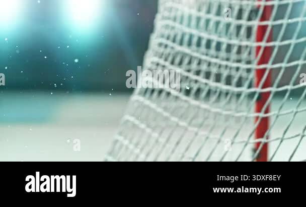 Extreme super slow motion close-up of a hockey goal net with ice ...
