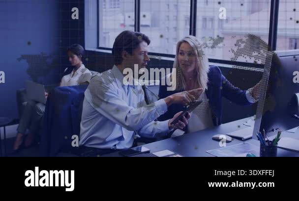 Man tapping tablet and showing animated chart on monitor for coworker ...