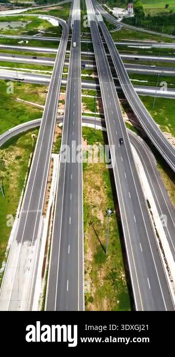 Aerial view of modern highway interchange with multilayer roads and ...