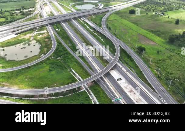 Aerial view of modern highway interchange with multilayer roads and ...