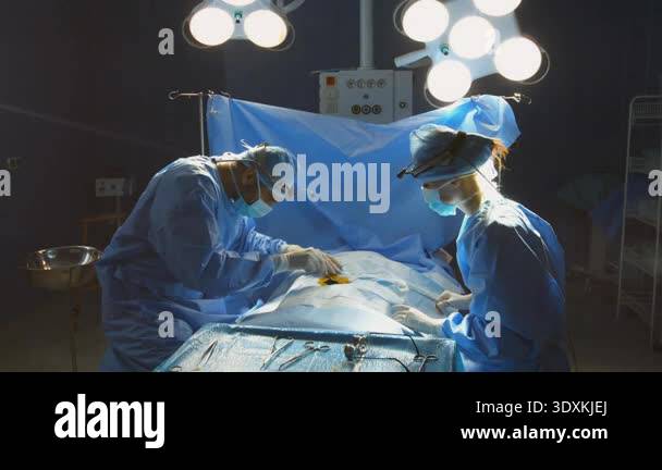 Surgeons confirming panel marking incision cutting numbing suturing ...