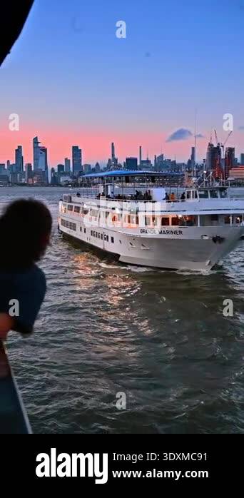 New York, USA, 25 August 2025: Person waving to Grande Mariner cruise ...