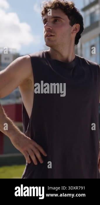 Cheerful motivated Caucasian sport man standing in confident pose ...