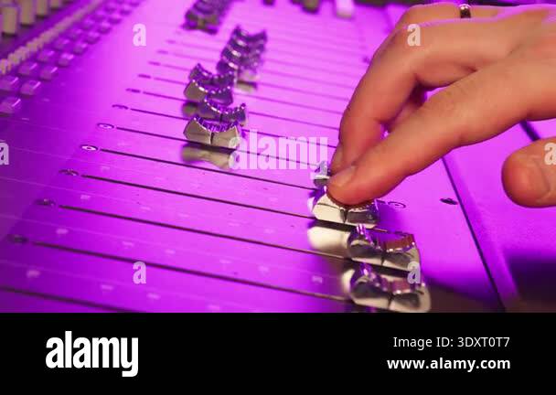 Hand Moves Fader, DJ Adjusts Audio Levels. Recording Studio, Concert ...