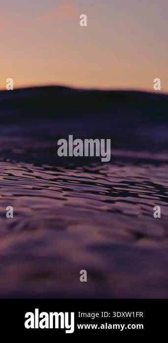 Vertical video. Low Angle View Of Sea Wave Rolling Toward Camera At ...