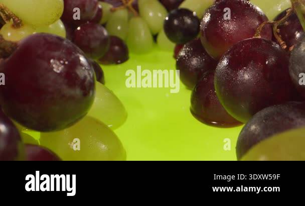 Abundant Mixed Grapes On Neon Green Surface, Layered Clusters Creating ...