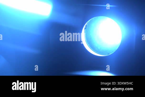Slow motion, Blue Wash Spotlight Sweeping Across Lens, Strong Neon Rim ...
