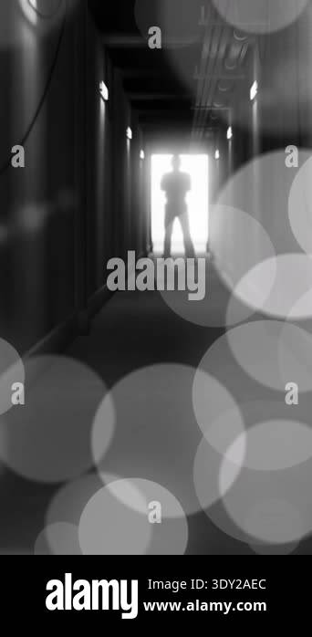 Animation of grey bokeh light spots over scary figure backlit in ...