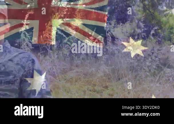 Flag overlay fading in over field and revealing U.S. Air Force member ...
