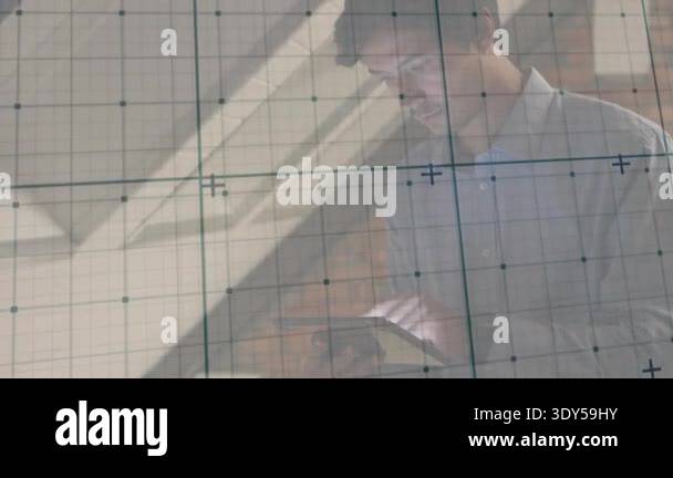 Man tapping tablet screen, initiating animated grid overlay on ...