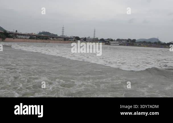 Unmatched Oceanic Splendor - Waves Roll into the City Horizon Stock ...