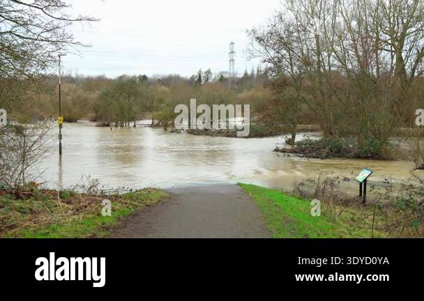 Severe river flooding after prolonged rain overflowing banks and ...