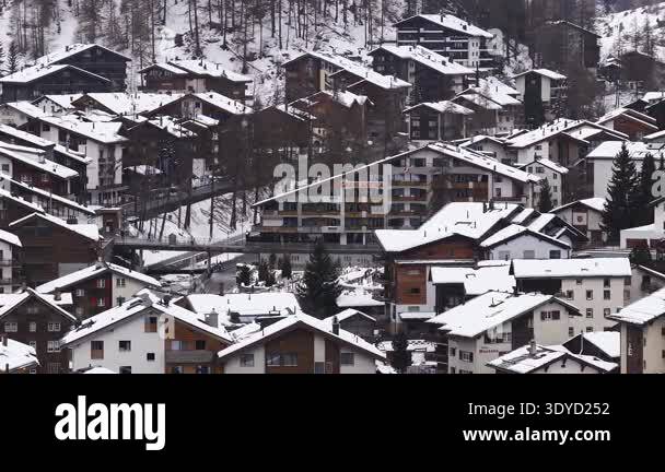 Aerial view of Zermatt, Switzerland, in winter overcast daylight. A ...