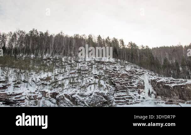 Landscape of snowy Siberia Krasnoyarsk mountains, granite marble quarry ...