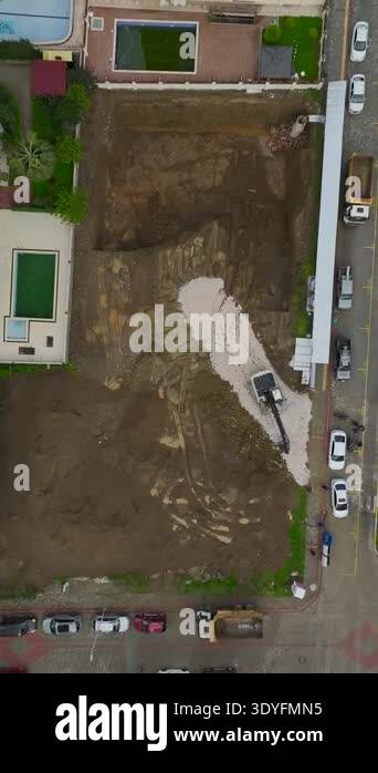 Machine clears ground and forms deep trench Stock Video Footage - Alamy