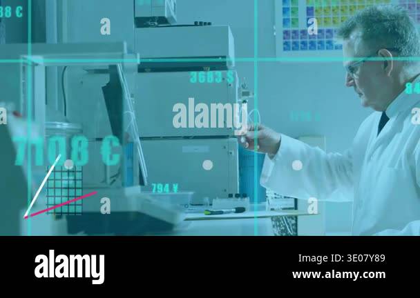 Lab scientist lifting vial, alternating instrument and keyboard use ...