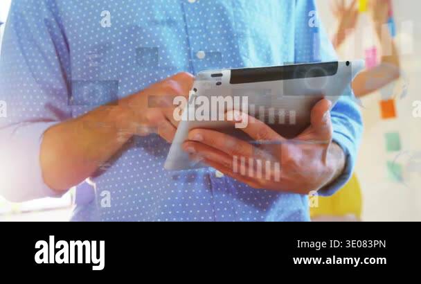 Man tapping tablet, causing HUD chart overlays while woman placing ...