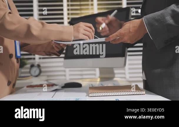 Close up view of businesspeople or accountant team working on financial ...