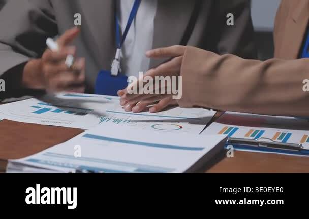 Close up view of businesspeople or accountant team working on financial ...