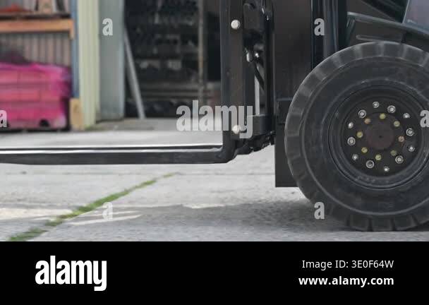 Forklift moving in warehouse logistics tracking shot industrial ...
