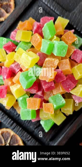Candied fruit in colorful cubes as an ingredient for baked goods and ...