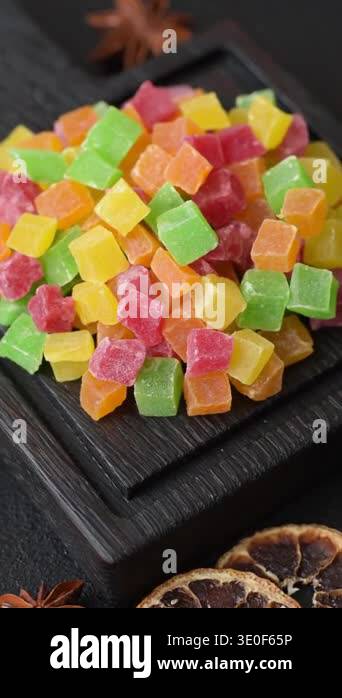 Candied fruit in colorful cubes as an ingredient for baked goods and ...