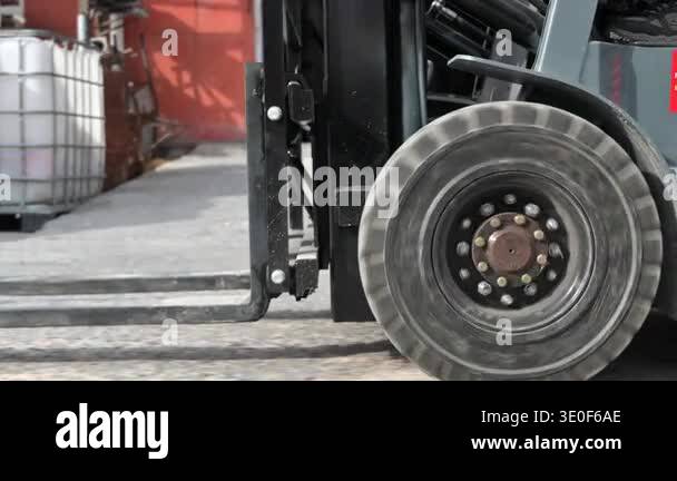 Forklift moving in warehouse logistics tracking shot industrial ...