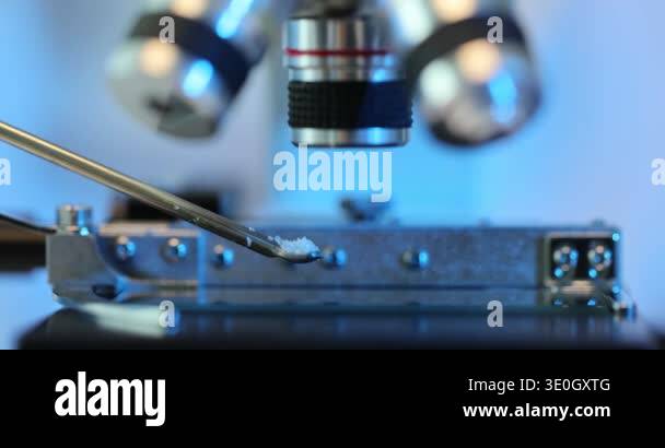 Microscopic analysis of crystalline white structures under a microscope ...