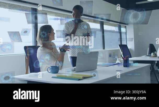 Office woman explaining data and activating UI overlays by gesturing to ...