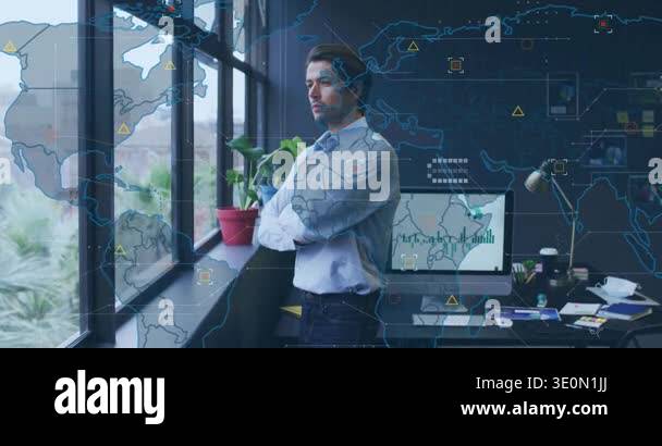 Male analyst standing by window analyzing data starting animating ...