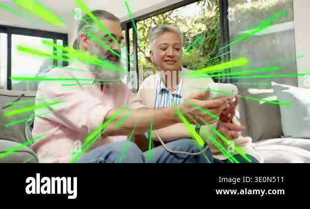 Man guiding woman holding white device on sofa, initiating health demo ...
