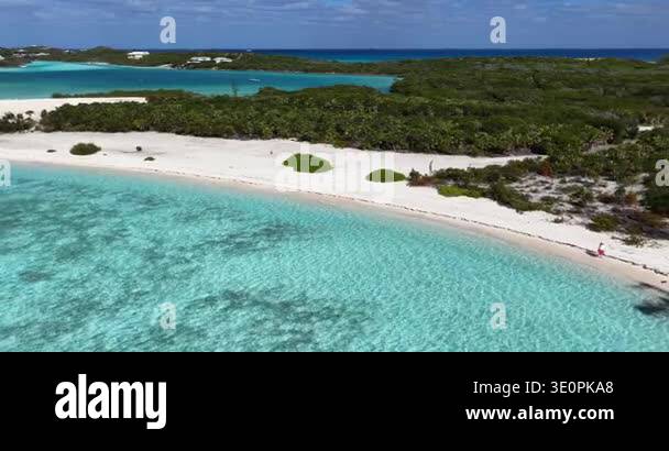 Aerial view of Stocking Island in Elizabeth Harbour with a woman ...