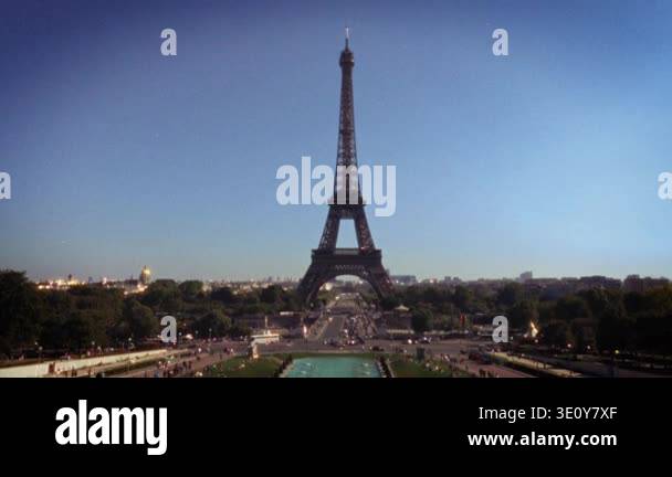 Focuses on eiffel tower, tourism, retro, handheld, blurry, travel ...