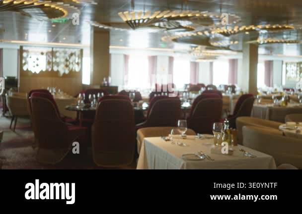 Blurred luxury restaurant dining room with soft bokeh and defocused ...