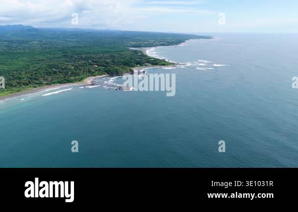 Stunning aerial view of a tropical coastline in costa rica. The blue ...